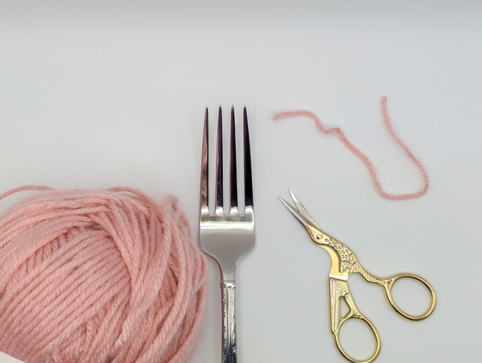 How to Make quick little Pom Poms Using Just a Fork (No Special Tools ...