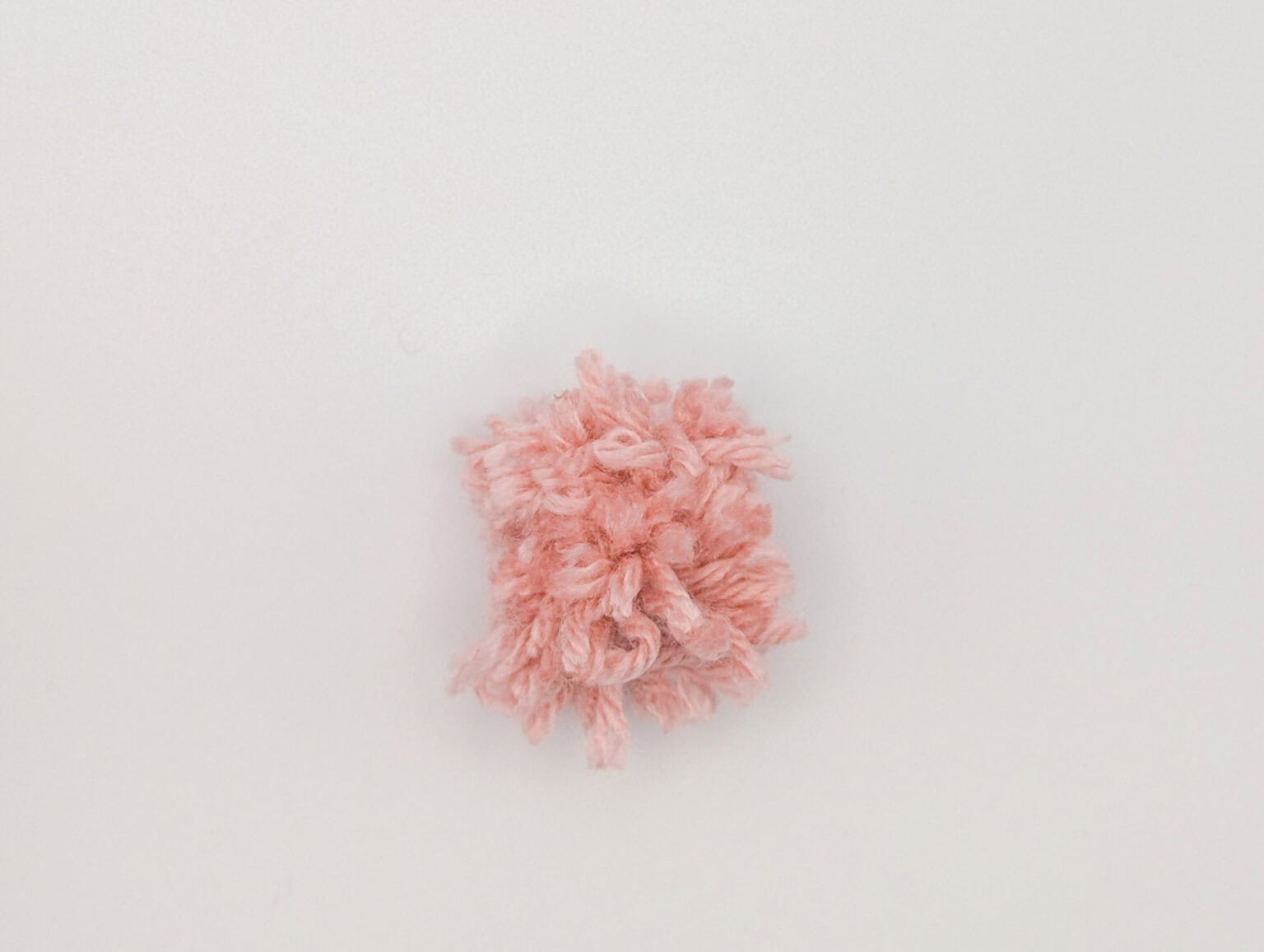 How to Make quick little Pom Poms Using Just a Fork (No Special Tools ...