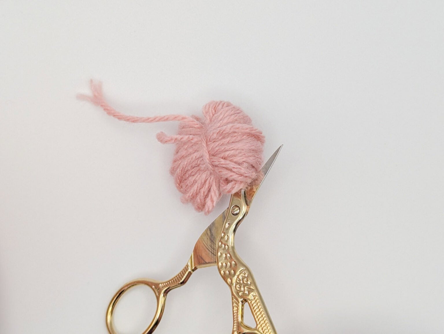 How to Make quick little Pom Poms Using Just a Fork (No Special Tools ...